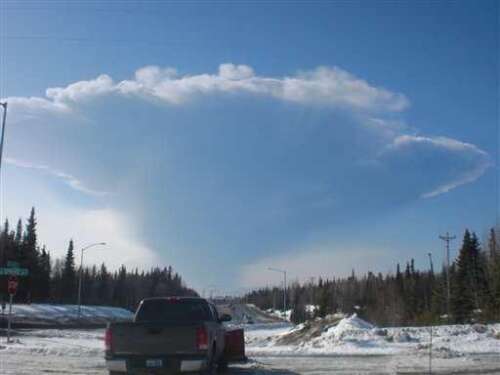 Alaska volcano spews 25,000 feet-high ash plume
