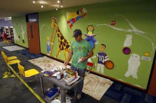 Mural helps bring Mt. Prospect Library alive