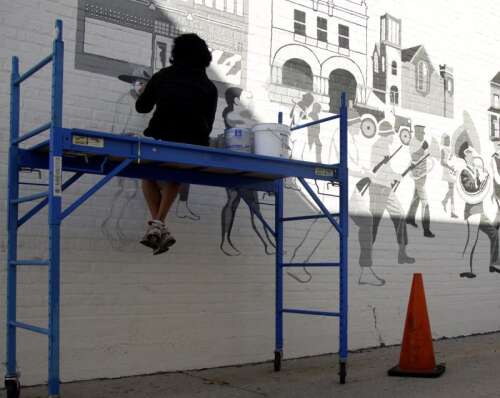 New mural honors Naperville history, parades