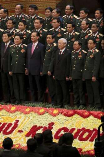 Vietnam ruling party boss re-elected, cements hold on power