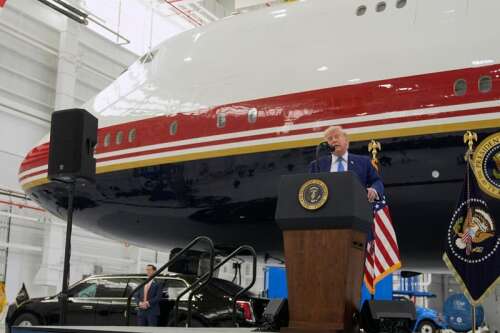 President Donald Trump unveils the new Air Force One, a converted ...