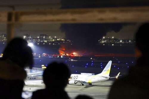 Planes catch fire after a collision at Japan's Haneda airport, killing ...