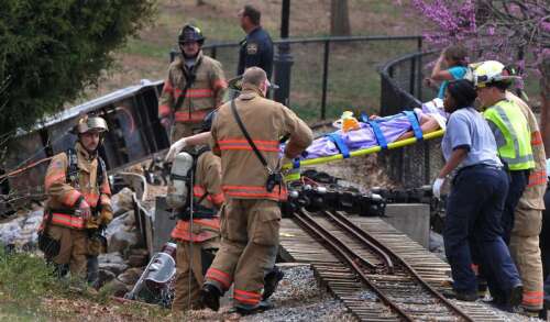 Screams fill 911 calls after fatal kids' train crash