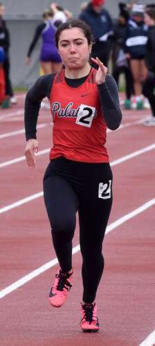 Girls Track And Field Athletes Battle Through Tough Conditions