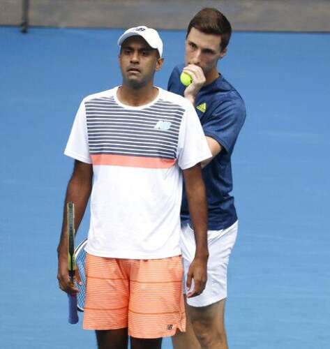 New dad Polasek wins 1st major doubles title in Australia