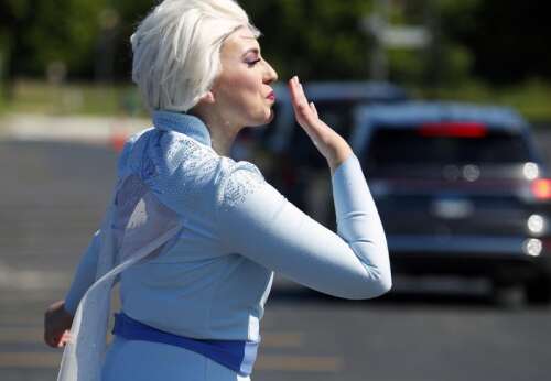 Princess and superheroes abound at drive-through Character Parade