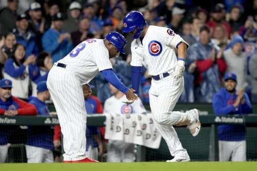 Cubs reignite playoff race with 14-1 win over Pirates