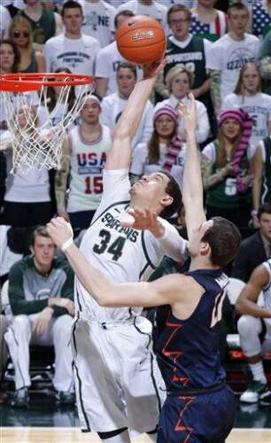 Illinois holds on to beat Michigan St. 59-54