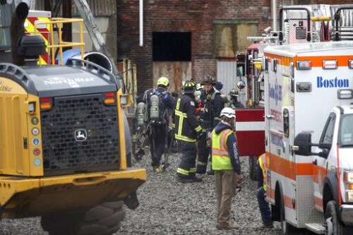 Boston firefighters pull hurt worker from collapsed building