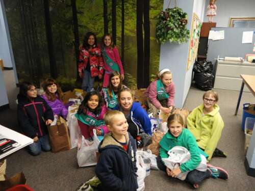 Girl Scout Troops Collect Food For Impoverished Families