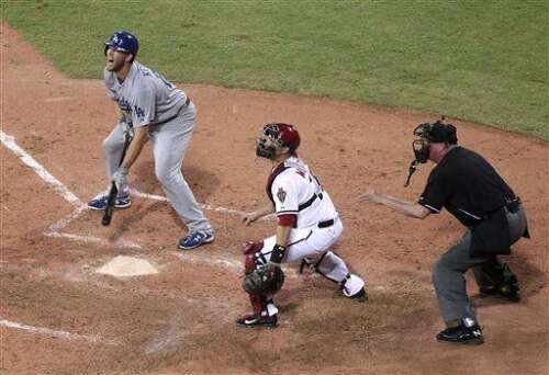 APNewsBreak: Longtime MLB umpire Tim Welke calls it a career