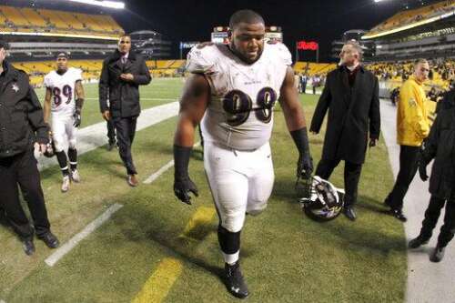 Ravens DT Williams 'glad to be home' after signing mega deal