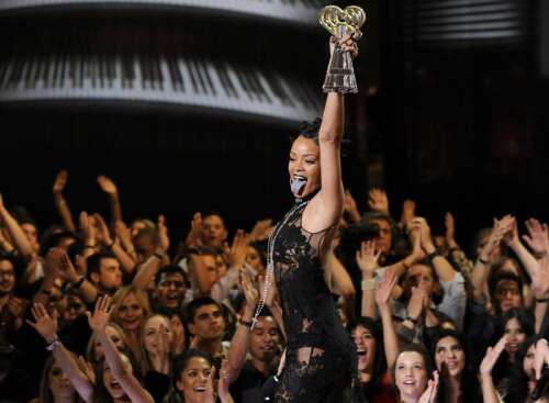 Tears of joy: Pharrell 'happy' at iHeartRadio awards show