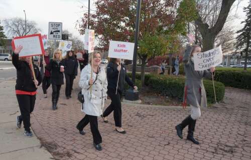 Addison teachers protest before mediation session