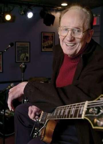 Guitar legend-inventor Les Paul dies at age 94