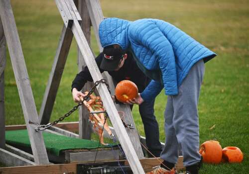 A smashing time: Flying pumpkins add excitement to collection event