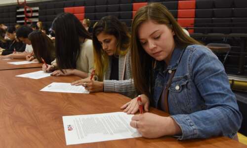 Signing day to become teachers for 110 District 214 students
