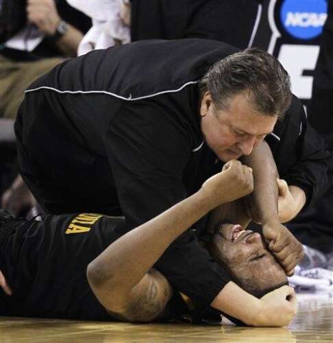 W. Va.'s Butler tears ACL