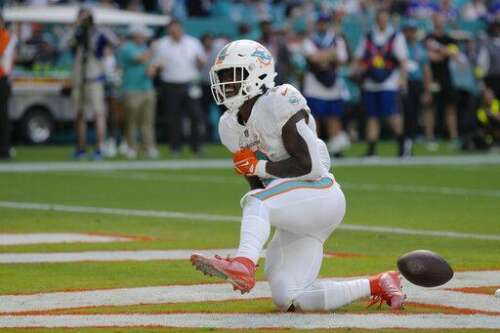 Dolphins halt Allen, survive 'butt punt' to beat Bills