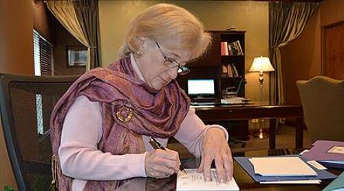 College of DuPage President Dr. Ann Rondeau Signs 788 Diplomas