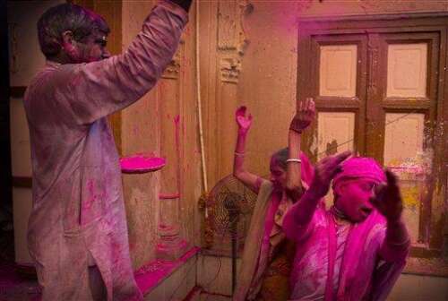 Breaking taboo, Hindu widows celebrate festival of colors