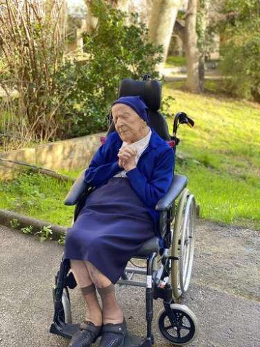 COVID-defying nun toasts 117th birthday with wine and prayer