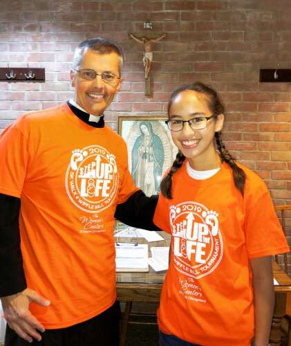 Batavia's Holy Cross parishioners in uproar as diocese replaces their ...