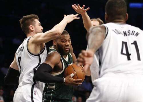 Bayless scores 26 points, Bucks beat Nets 103-96