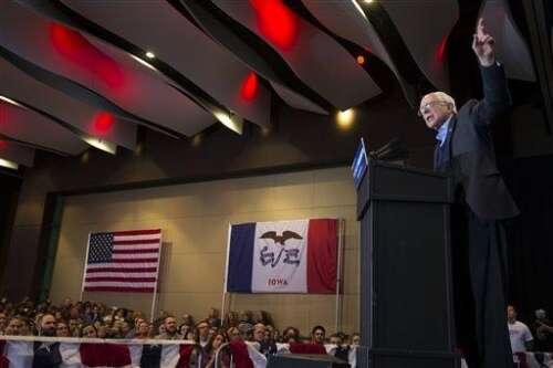 In final Iowa blitz, an outraged Clinton channels Sanders