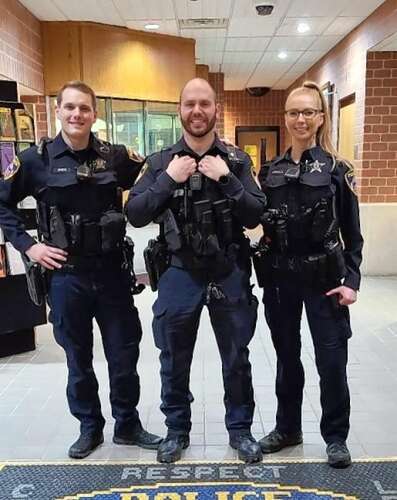 How a team of Wheaton officers saved a woman who fell through the ice