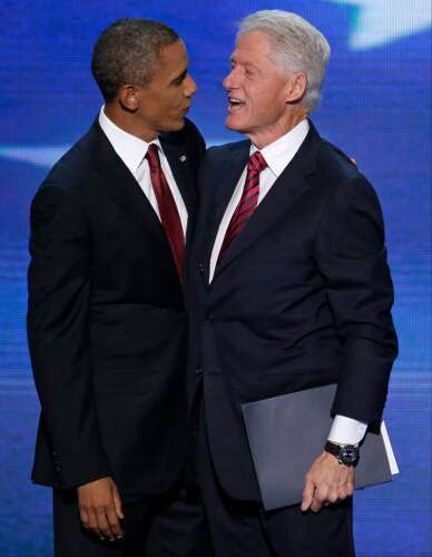 Clinton bows to Obama? And they hug?