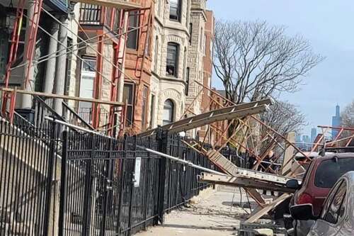 Building facade collapses on construction workers