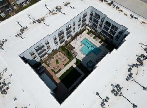 Suburban Skyview: Outdoor swimming pool is focal point at new Vernon ...