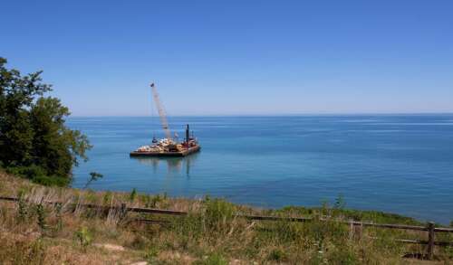 Reef construction provides a man-made assist for Lake Michigan fish and ...