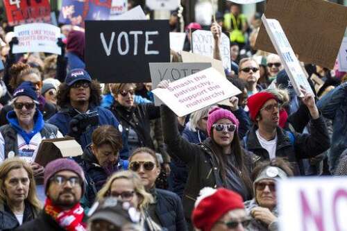 Thousands march in Chicago to encourage voting in midterms