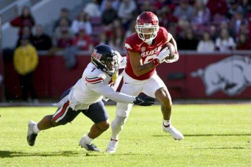 No. 23 Liberty gets goal-line stop, beats Arkansas 21-19