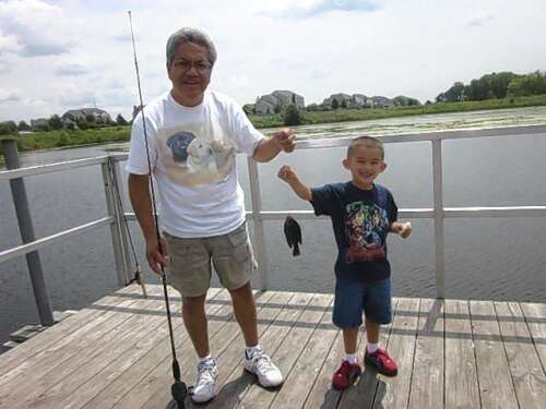 How Elgin twins reunited 1,200 family photos at bottom of pond with ...