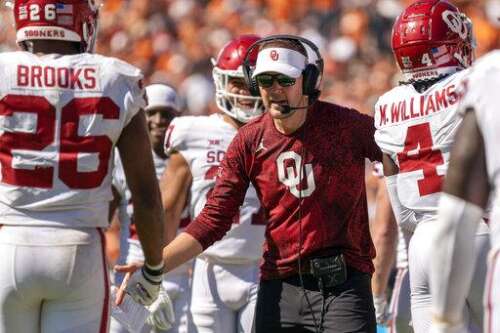 Boomer: Brooks 2 late TDs, No. 6 Oklahoma beats Texas 55-48