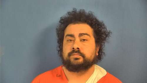 Man Charged With Recklessly Firing Gun In Apartment Complex