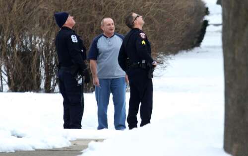 Officials: Zion police shoot man taking photos of schools