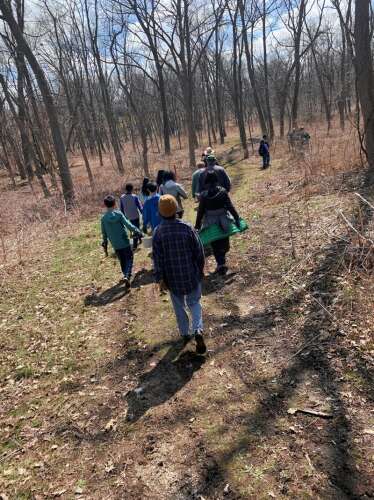 Volunteers plant oak trees in tornado-damaged portion of DuPage County