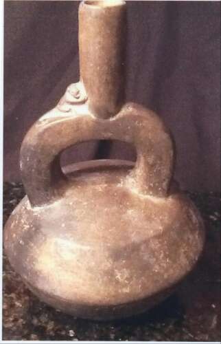 A pre-Columbian stirrup pot — or is it?