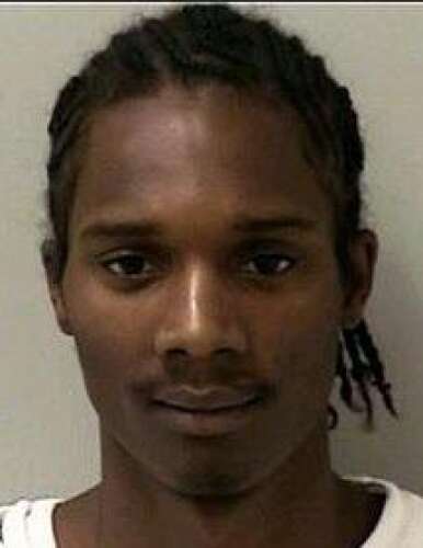 2 charged, 1 sought in Elgin robbery