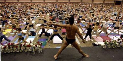 Hot yoga founder ordered to pay in harassment lawsuit