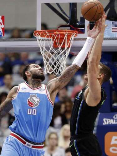 Randolph keys big first half as Kings top Mavericks 114-109