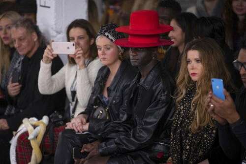 Climate change protest brings flares to London Fashion week