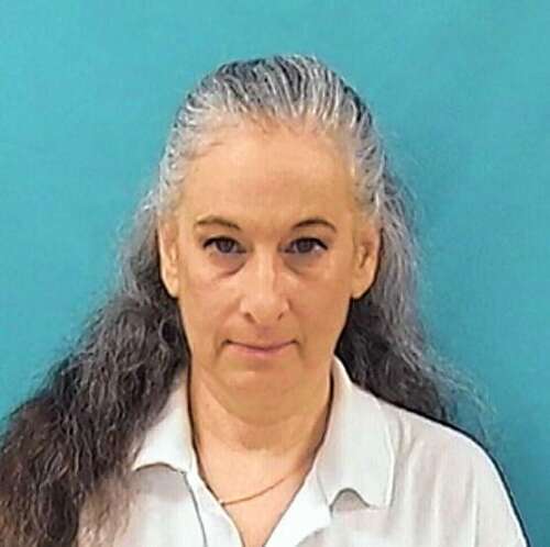 Yang appears in court as part of retrial effort