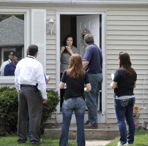 Flood assessment teams pour through DuPage neighborhoods