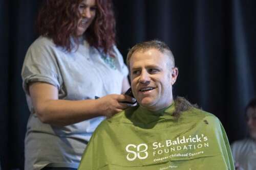 'It's just hair': Streamwood police, firefighters shave heads to help ...