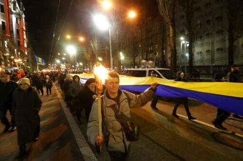 Torchlight parade in Kyiv honors Nazi-linked nationalist